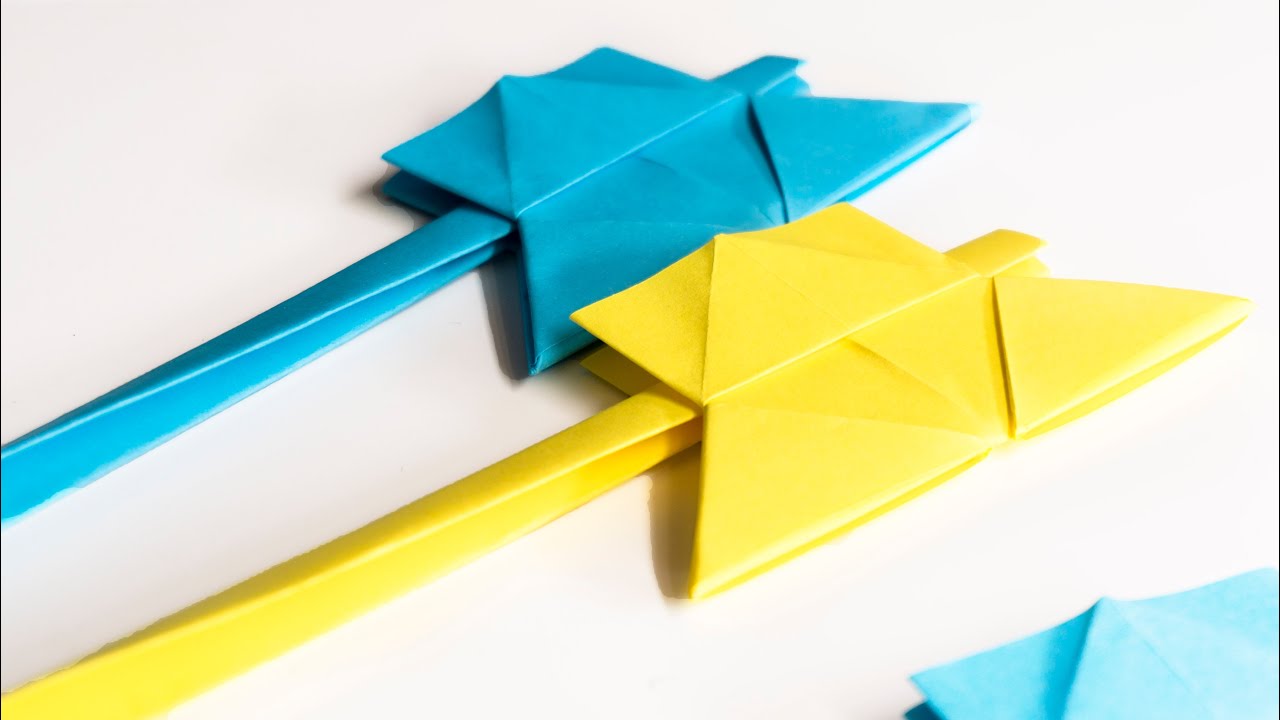 Como hacer un hacha de papel - YouTube
