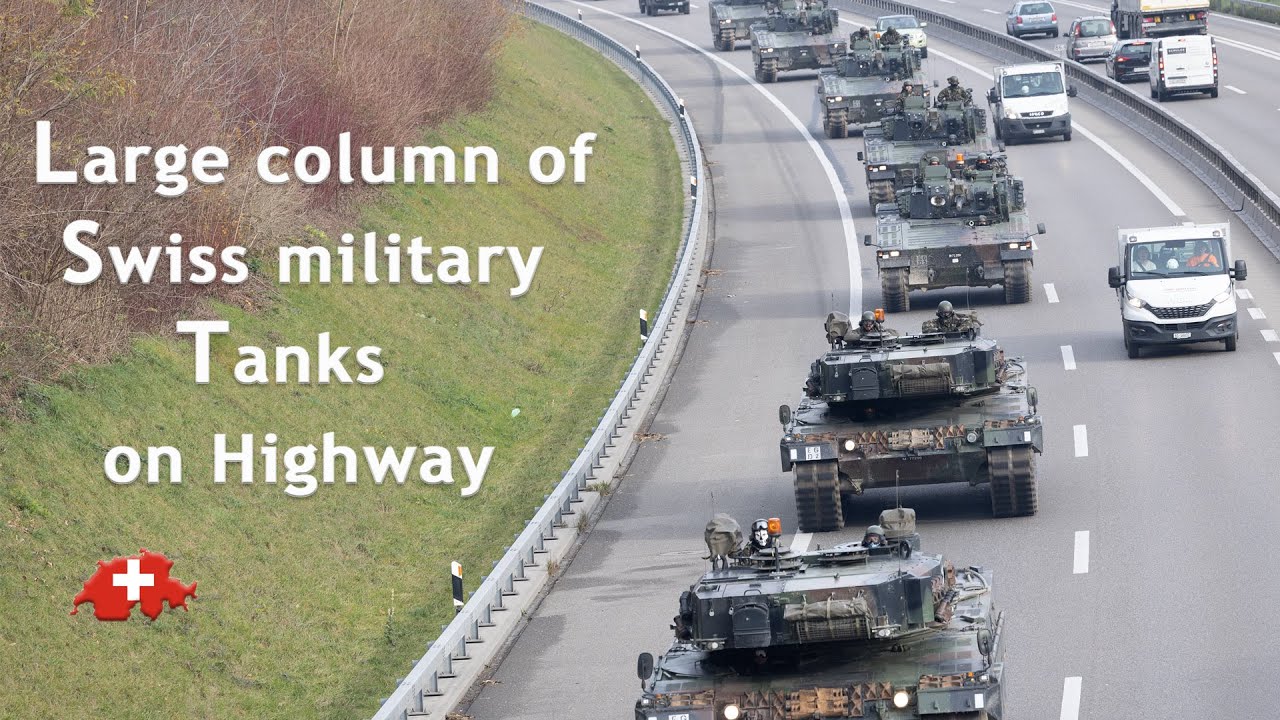 Large column of Swiss military Leopard Tanks on Highway in Switzerland ...