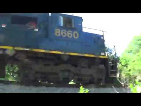 CSX 8660 Leads a Manifest with an SD60I and the Safety Train Boxcar on ...