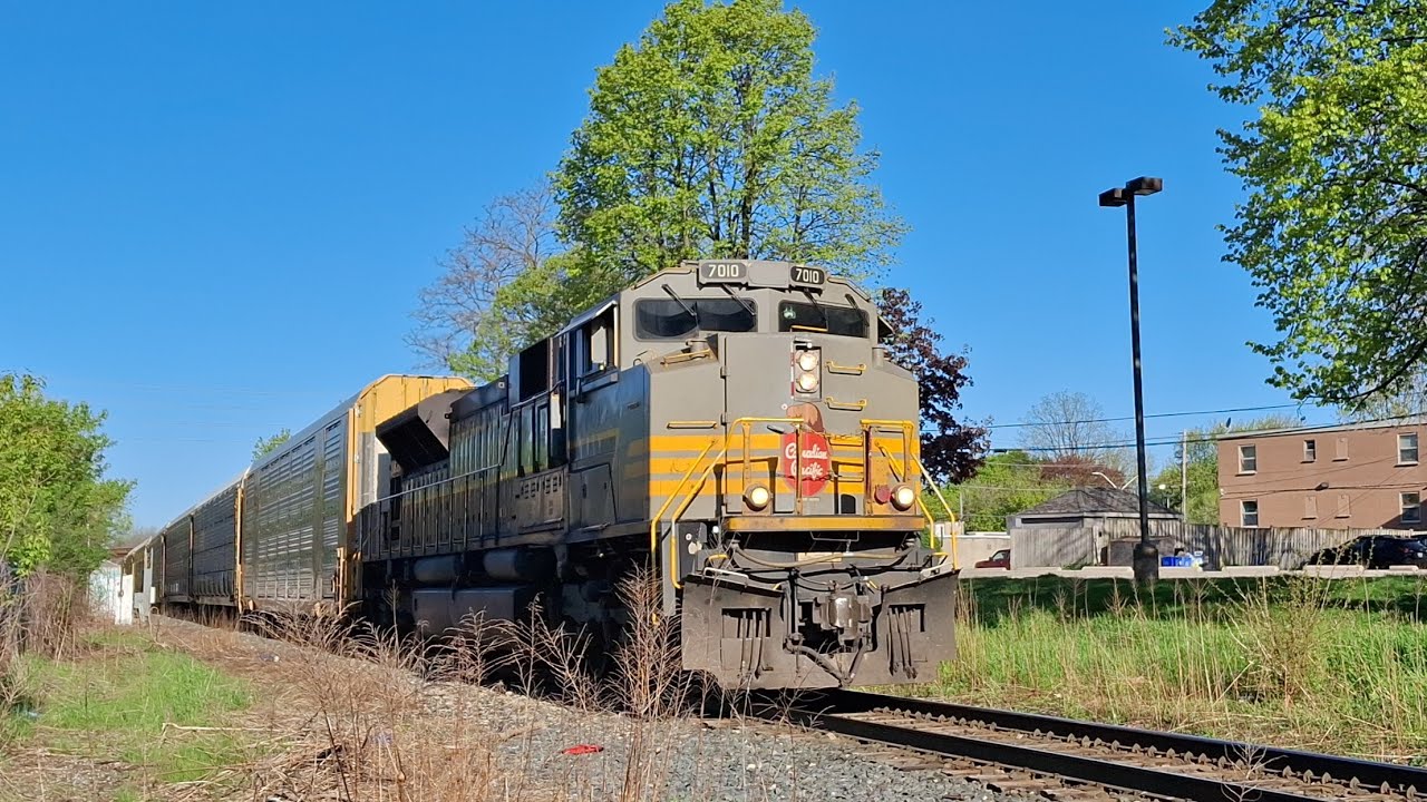CPKC Heritage Unit - CP 7010 Leads an Autorack Train as it Approaches ...
