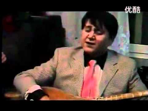 Abdukeram gulja olturux  *Uyghur*