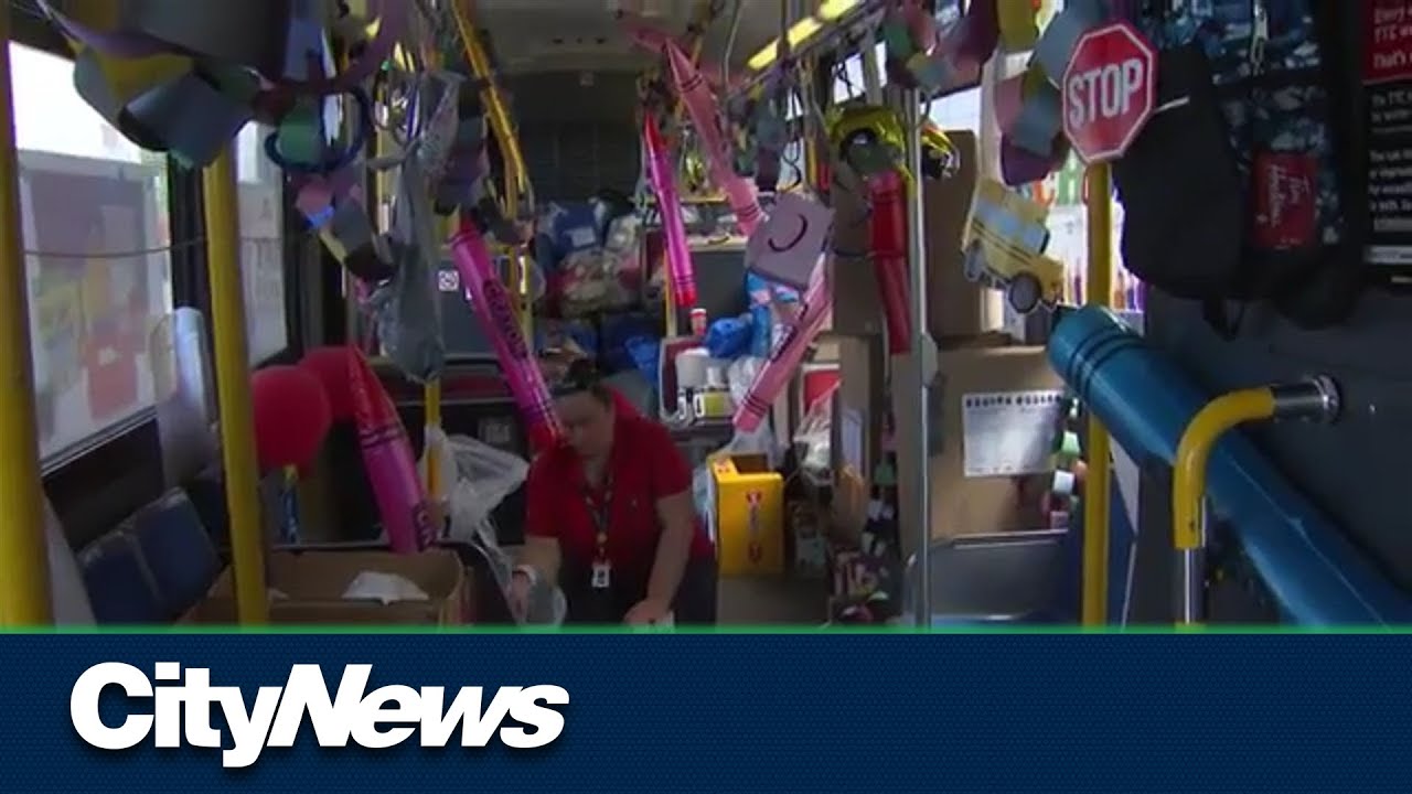 TTC “stuffing the bus” with backpacks for children in need - YouTube