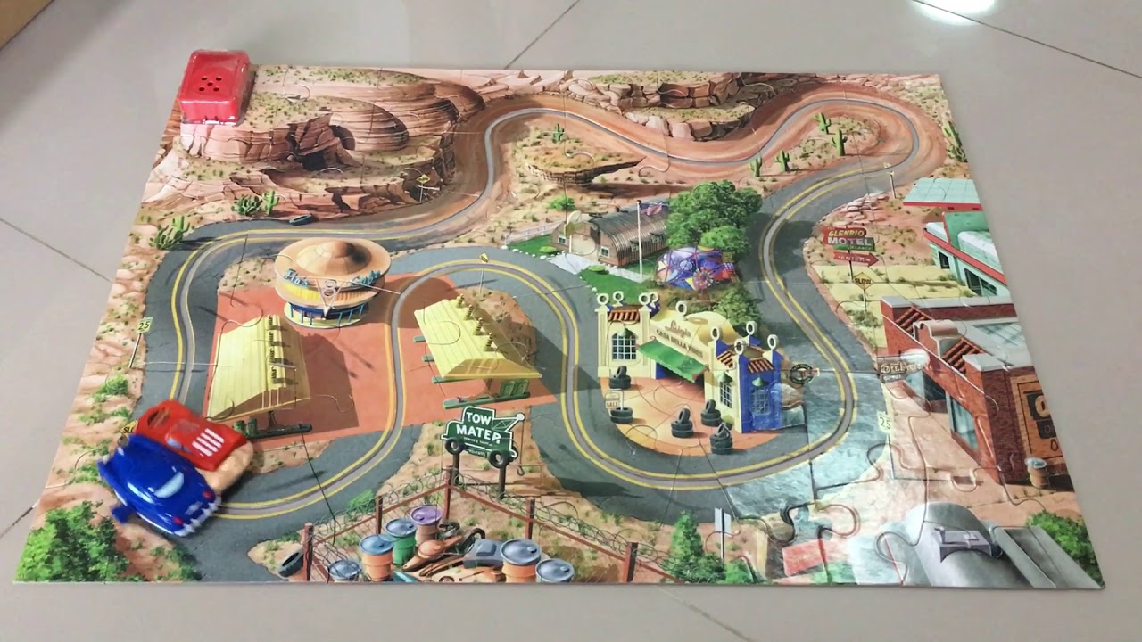 Cars Whiz around musical floor puzzle - YouTube