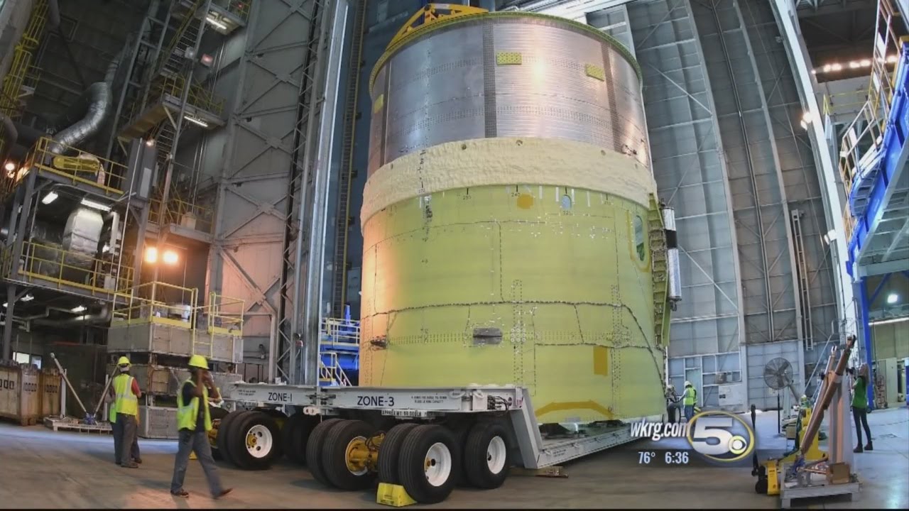 WATCH: NASA's Biggest Rocket Yet Begins Journey by Water - YouTube