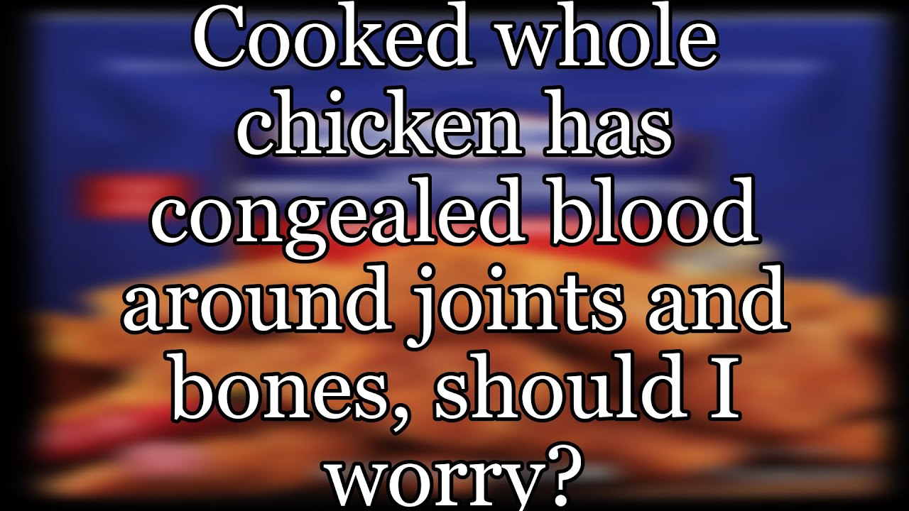 Cooked whole chicken has congealed blood around joints and bones ...