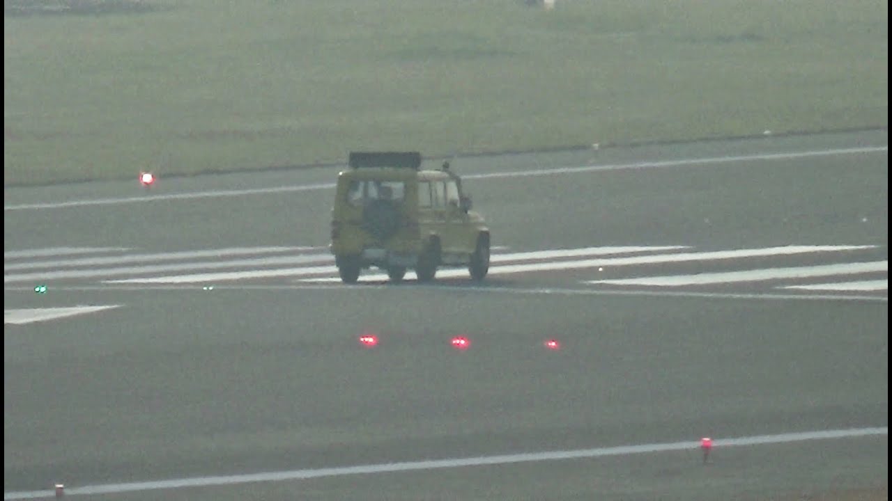 A Car running on the Airport Runway - YouTube