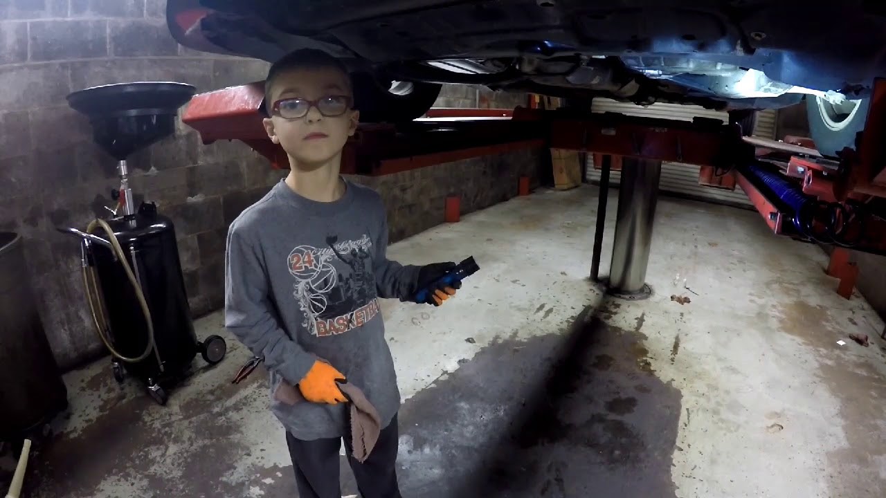 OIL CHANGE BY A KID - YouTube