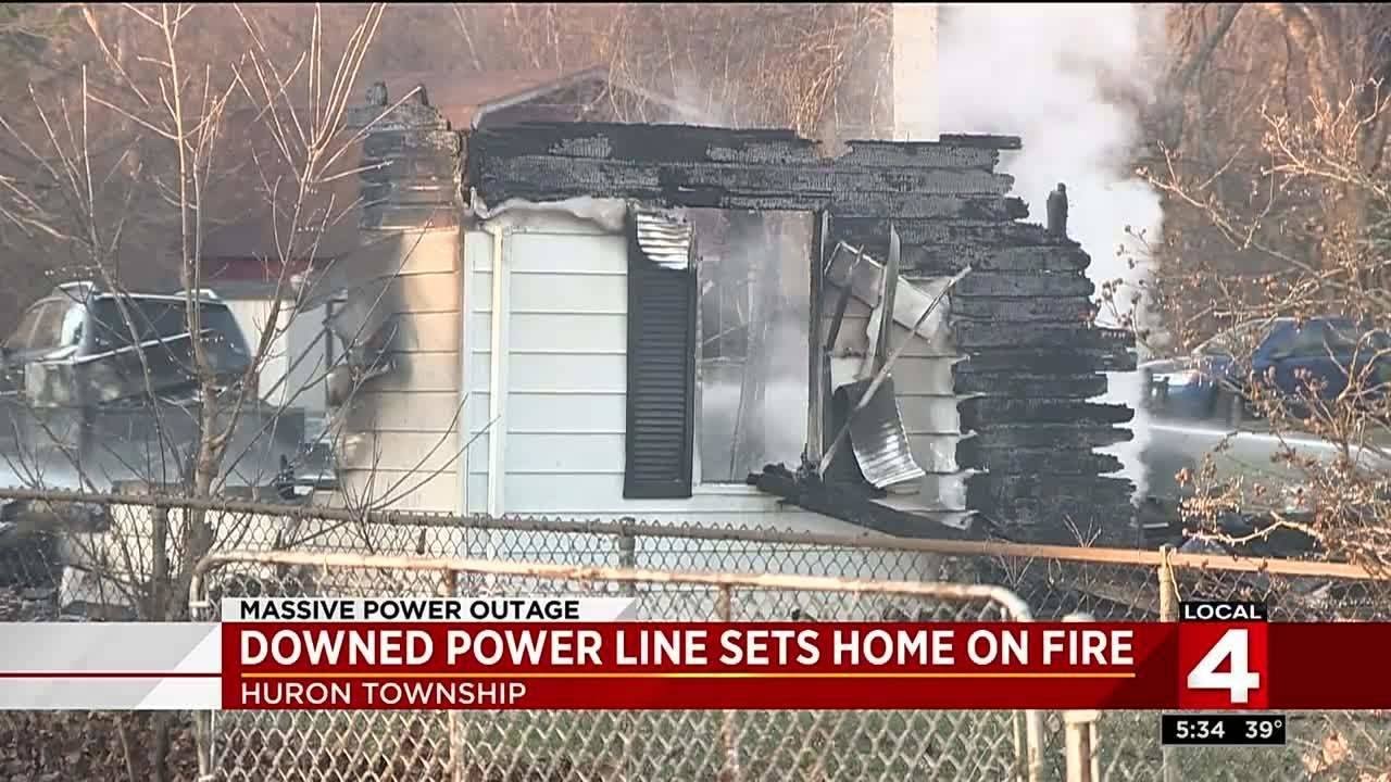 Downed power line sets home on fire - YouTube