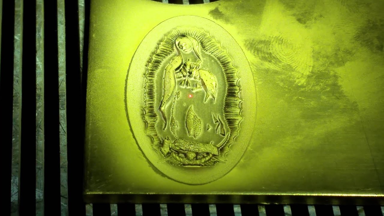Virgin Mary 3D laser engraving in Gold on the QM50 - YouTube