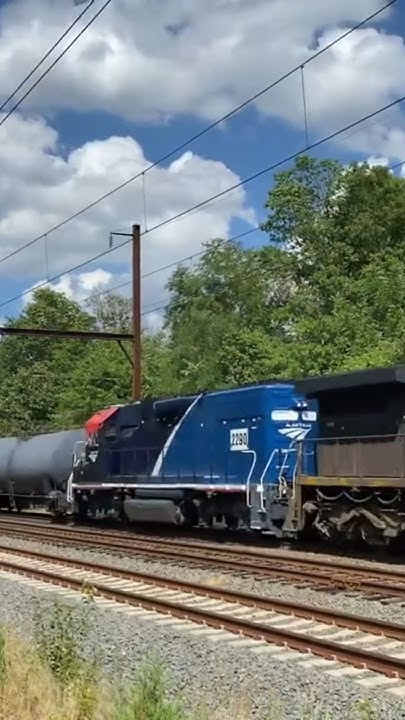 CSX M403 with a Ex Amtrak GP38-3 - YouTube