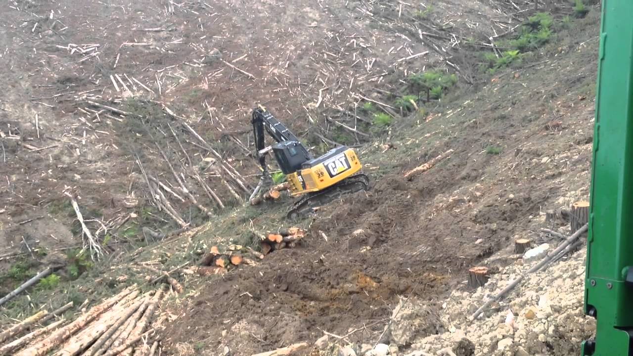 Forest machine CAT 568LL - YouTube