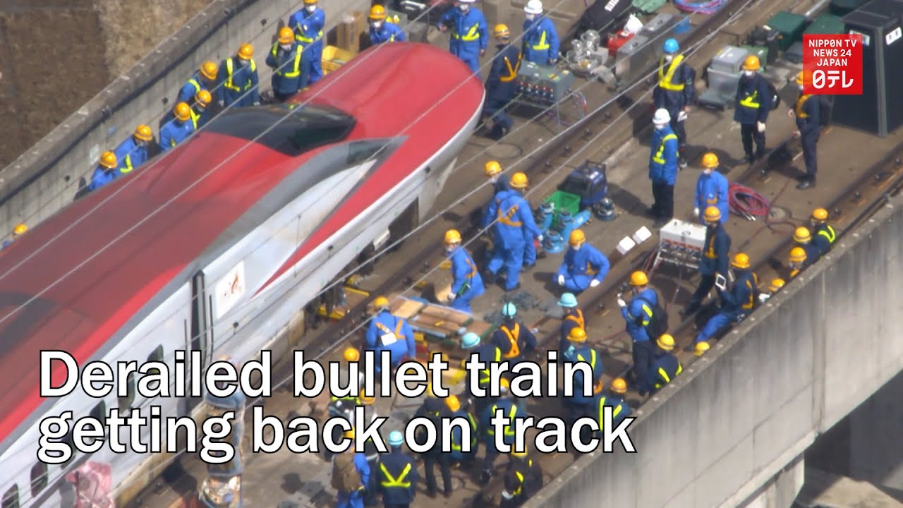 Derailed bullet train getting back on track - YouTube