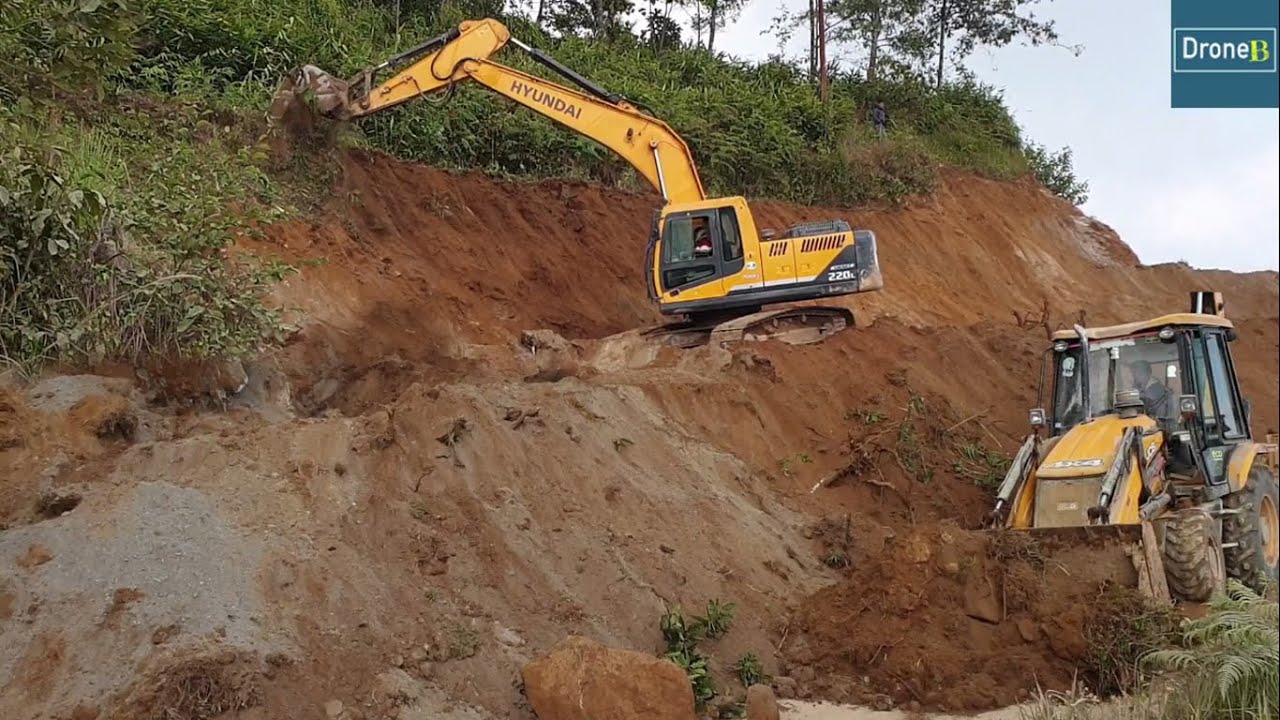 Cutting Hill-Hyundai Excavator-Backhoe Loader-Mid Hilly Road ...