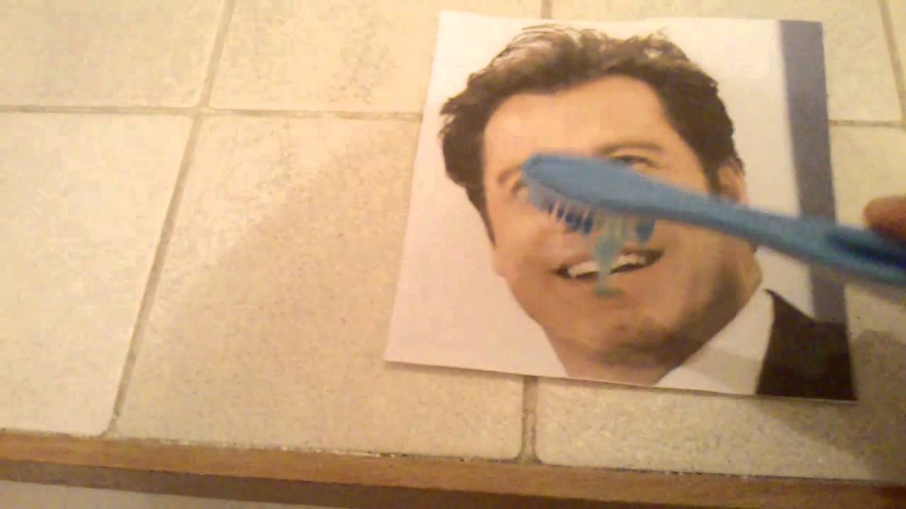 John Travolta brushes his teeth - YouTube