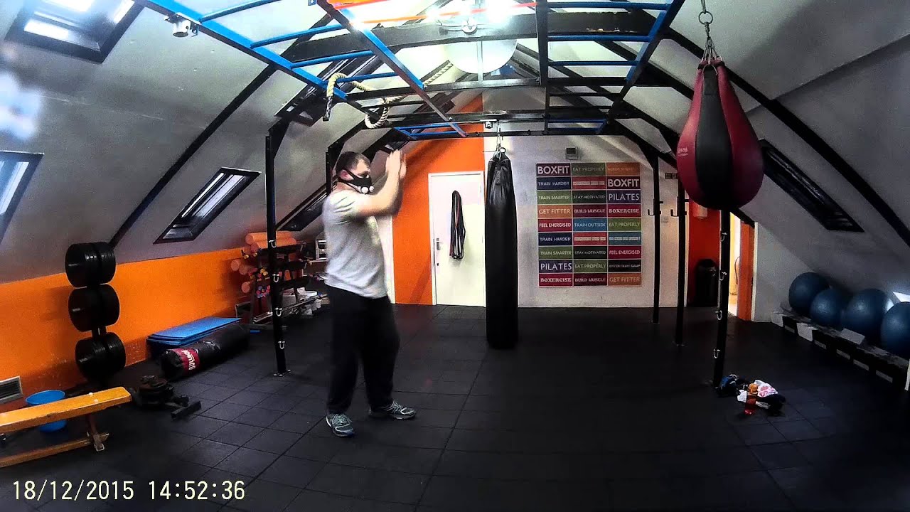 Bas Rutten MMA workout with a training mask on. - YouTube