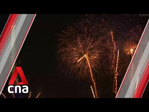 France celebrates Bastille Day with Eiffel Tower fireworks