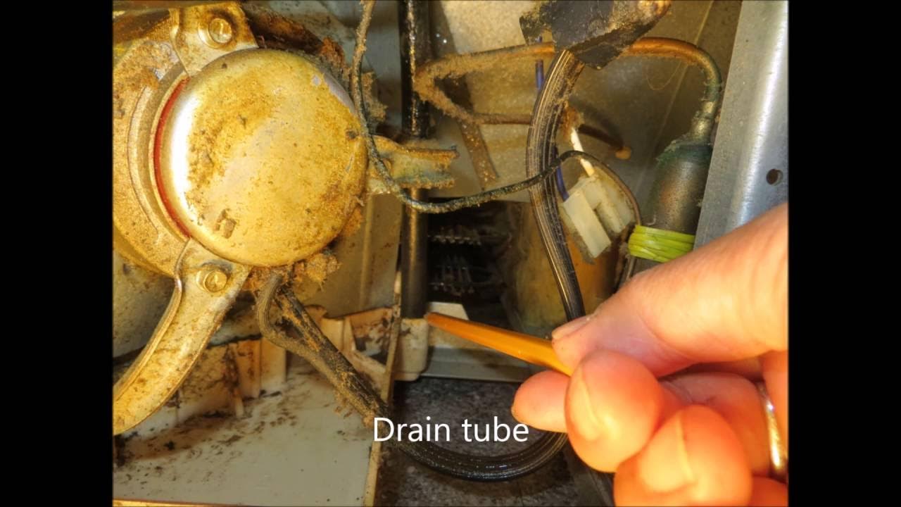 How to clear Kenmore side by side refrigerator clogged drain tube - YouTube