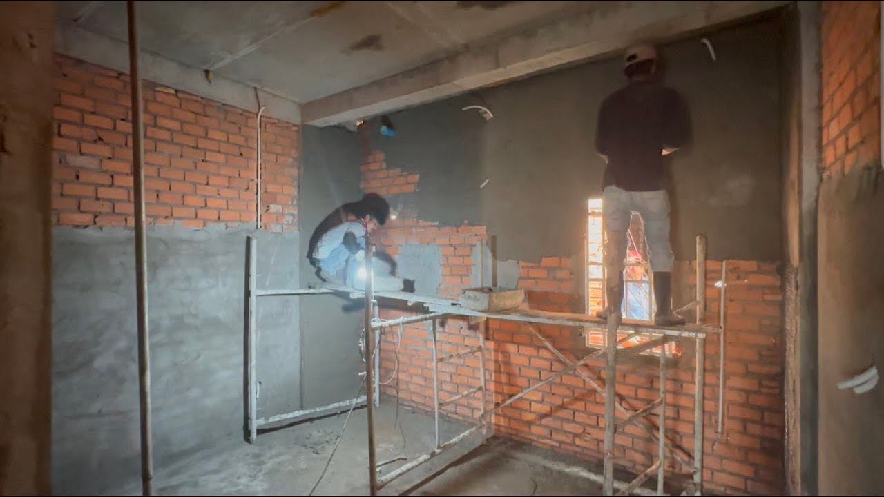 Hand Wall Plastering Techniques House concrete hand wall plastering ...