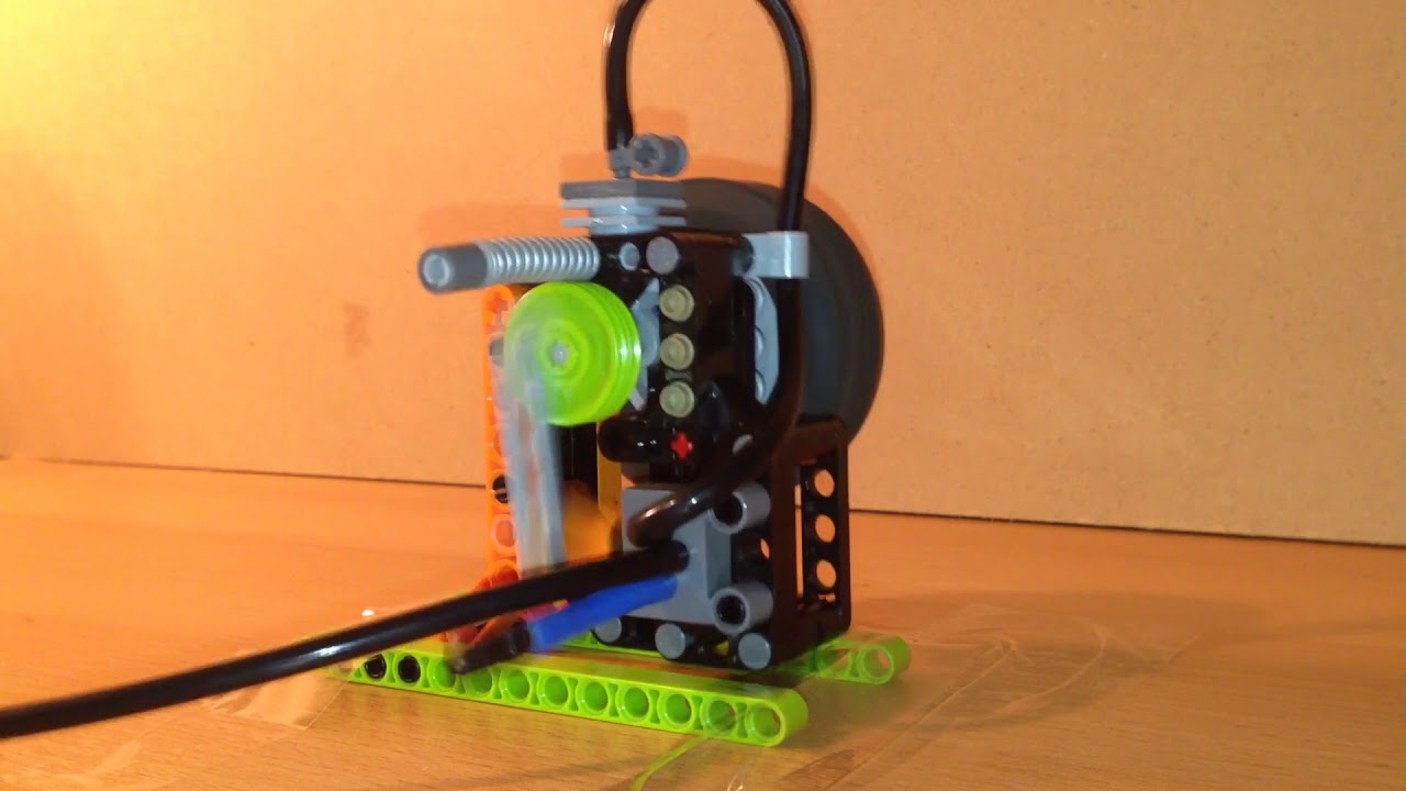 Lego pneumatic engine with one cylinder (first start) - YouTube