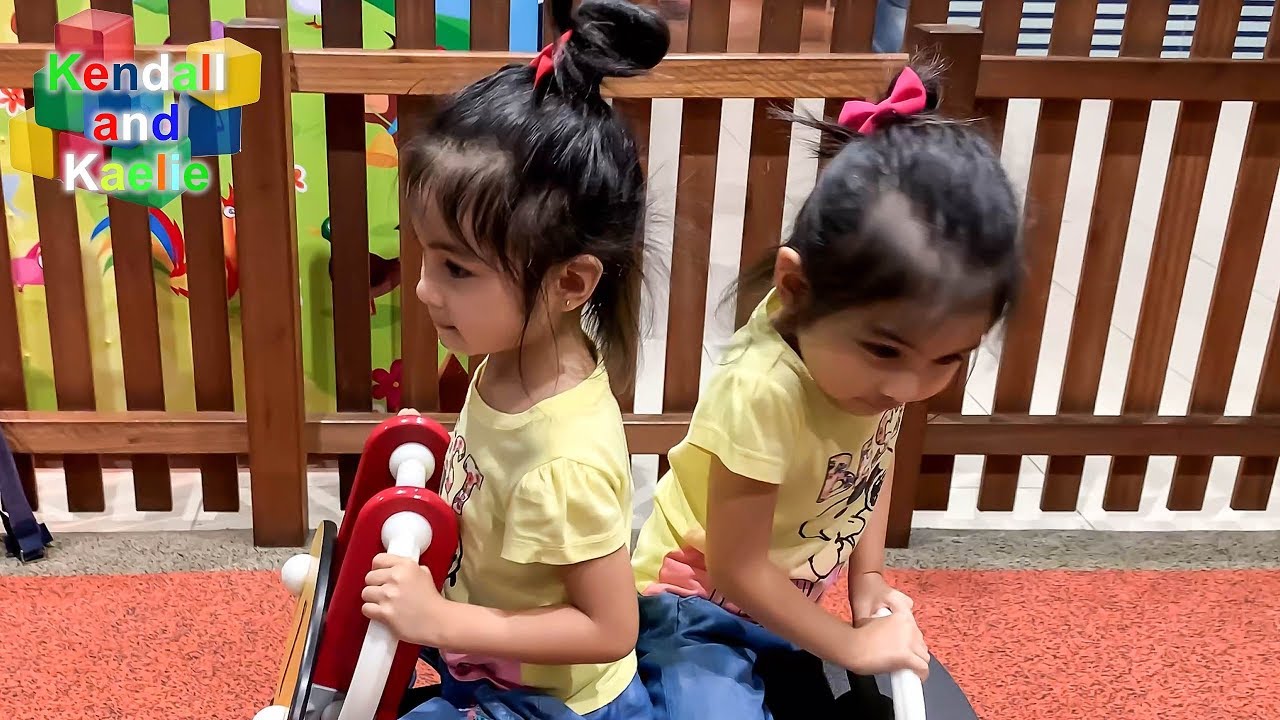 Twin sisters while playing in an indoor playground in Singapore - YouTube