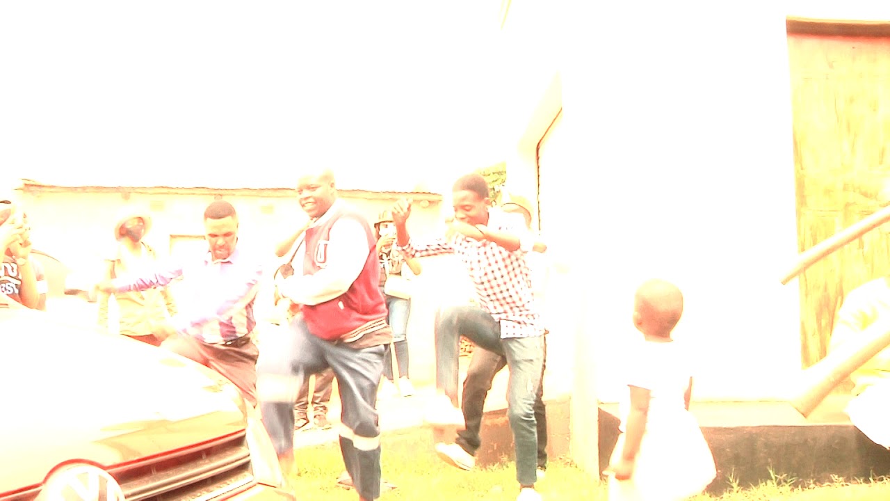 Izimbungulu playing an african indigenous horn instrument called ...