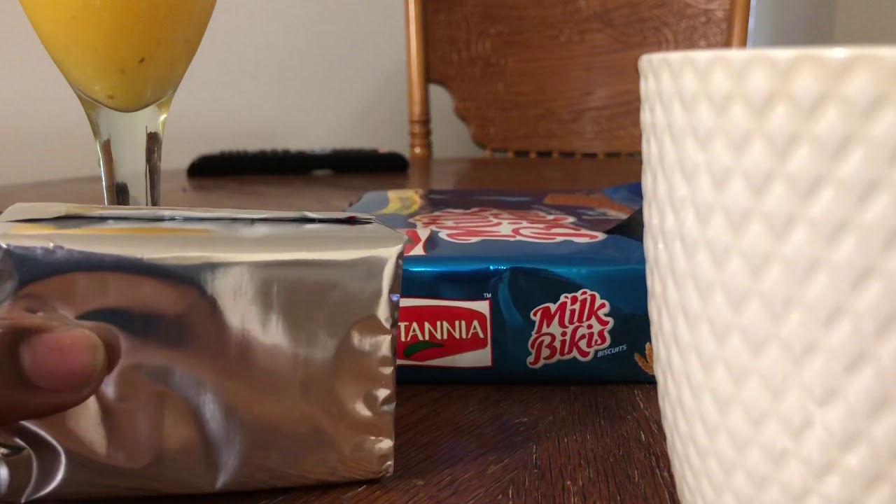 How to stir Milk Bikis in Hot Milk - YouTube