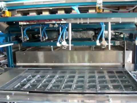Automatic vacuum forming machine - YouTube