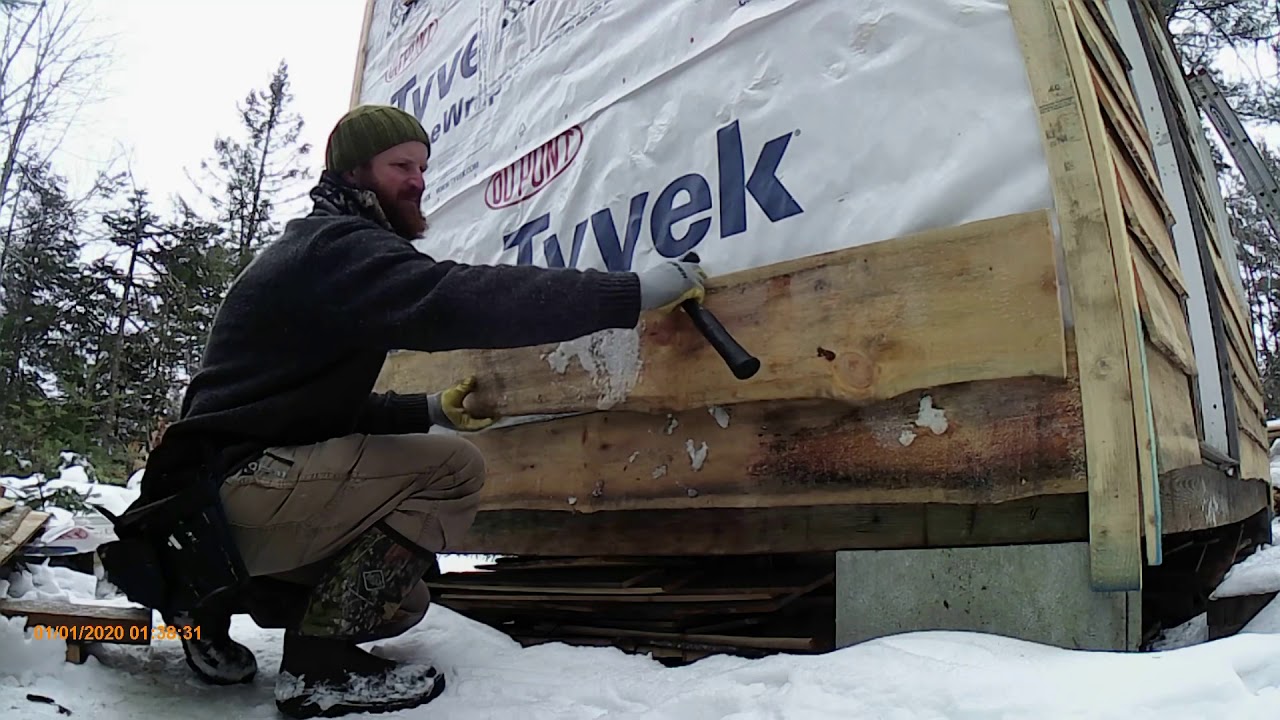 Off grid tiny cabin live edge siding - YouTube