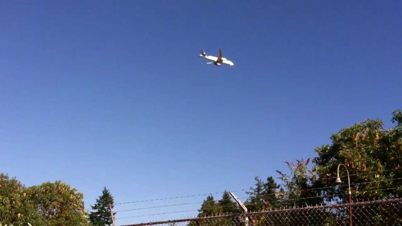 Boeing 777 Flying Over Possession Sound - YouTube
