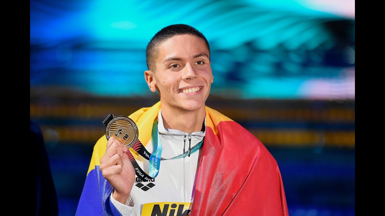 The gold of hope! David Popovici, world champion swimmer, melts gold ...