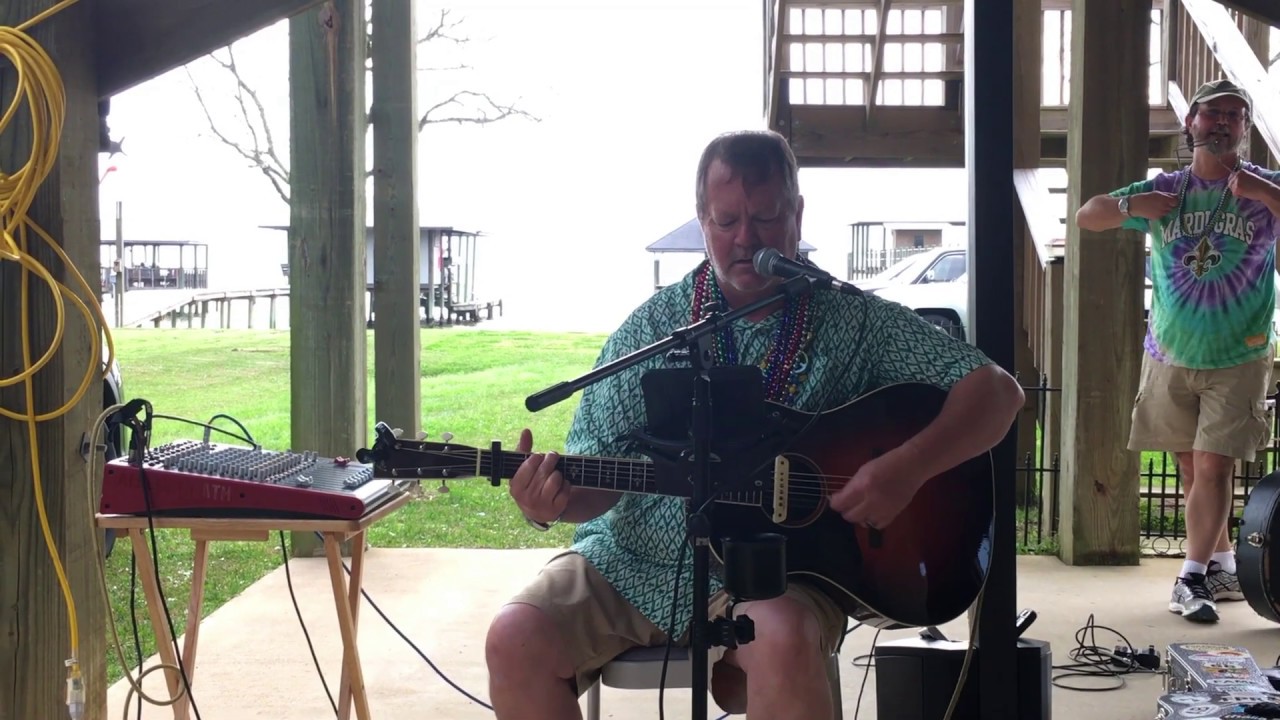Roger Wheeler performs his song "I Can't Take Me Anywhere" at a gig on ...