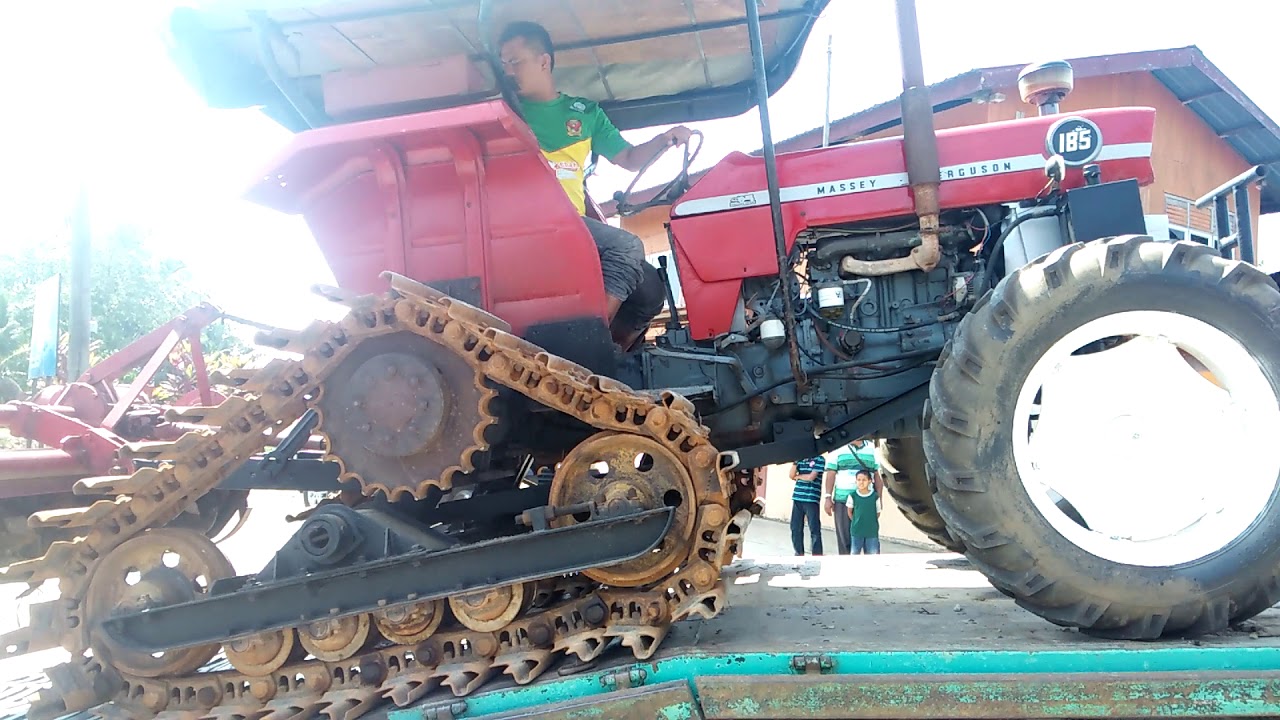 Tractor track MF 185 turun dari lori msi - YouTube