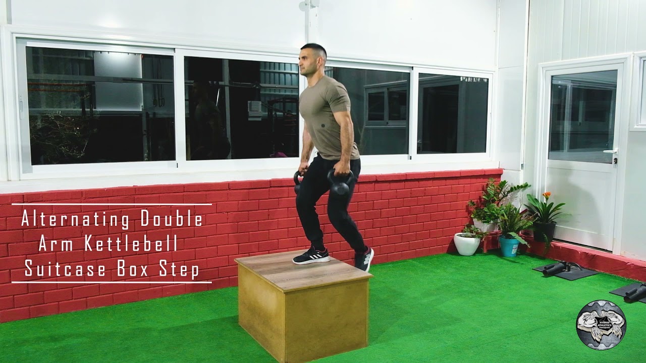 How to do an Alternating Double Arm Kettlebell Suitcase Box Step Up ...