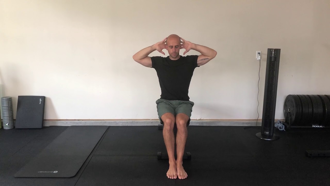 Seated t-spine rotation - YouTube