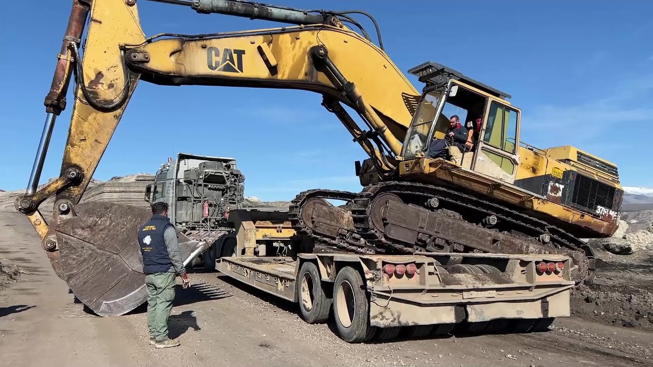 Loading And Transporting On Site The Caterpillar 375 Excavator ...