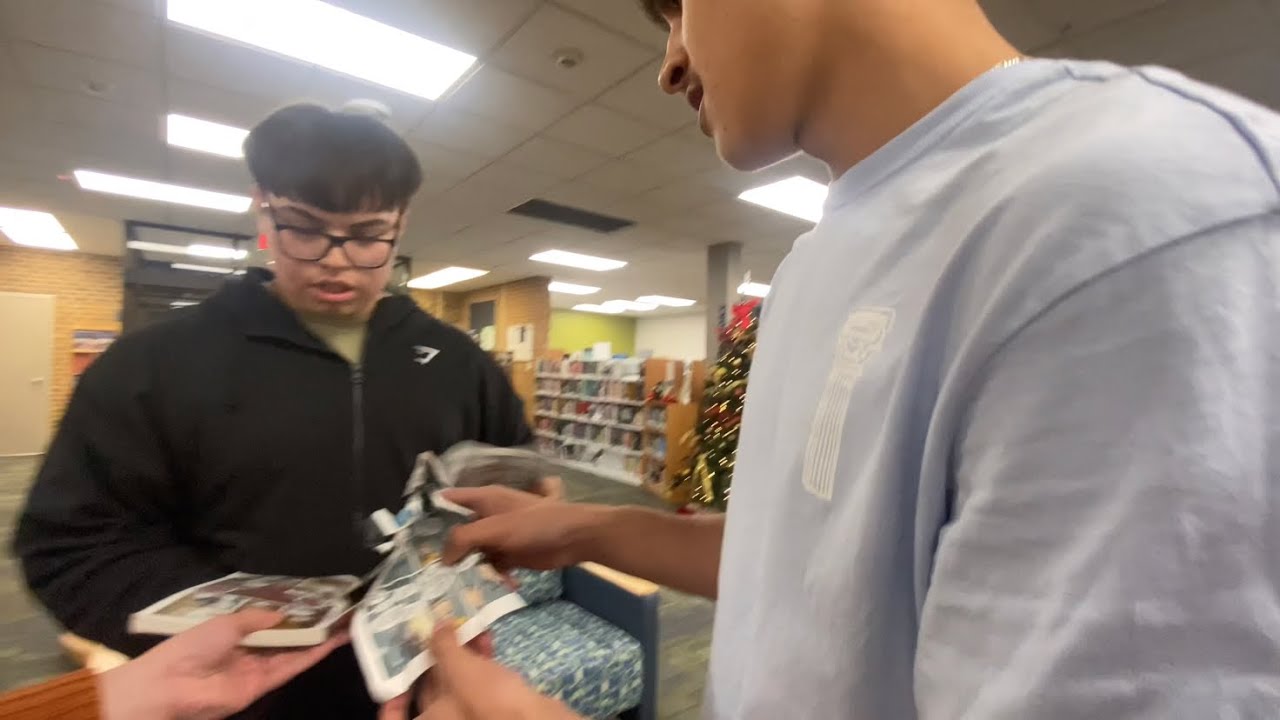 RIPPING BOOKS IN THE LIBRARY (PRANK) - YouTube