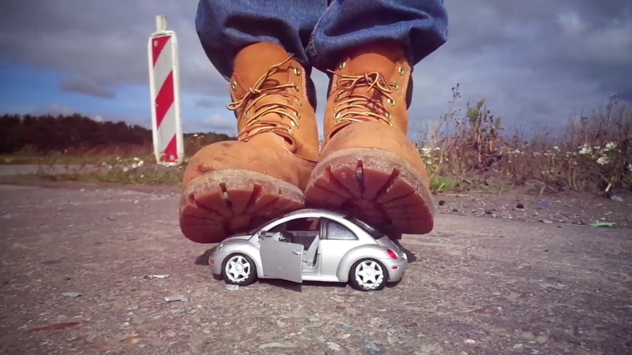 Timberland Boots stomp, trample and destroy VW New Beetle model toy car ...