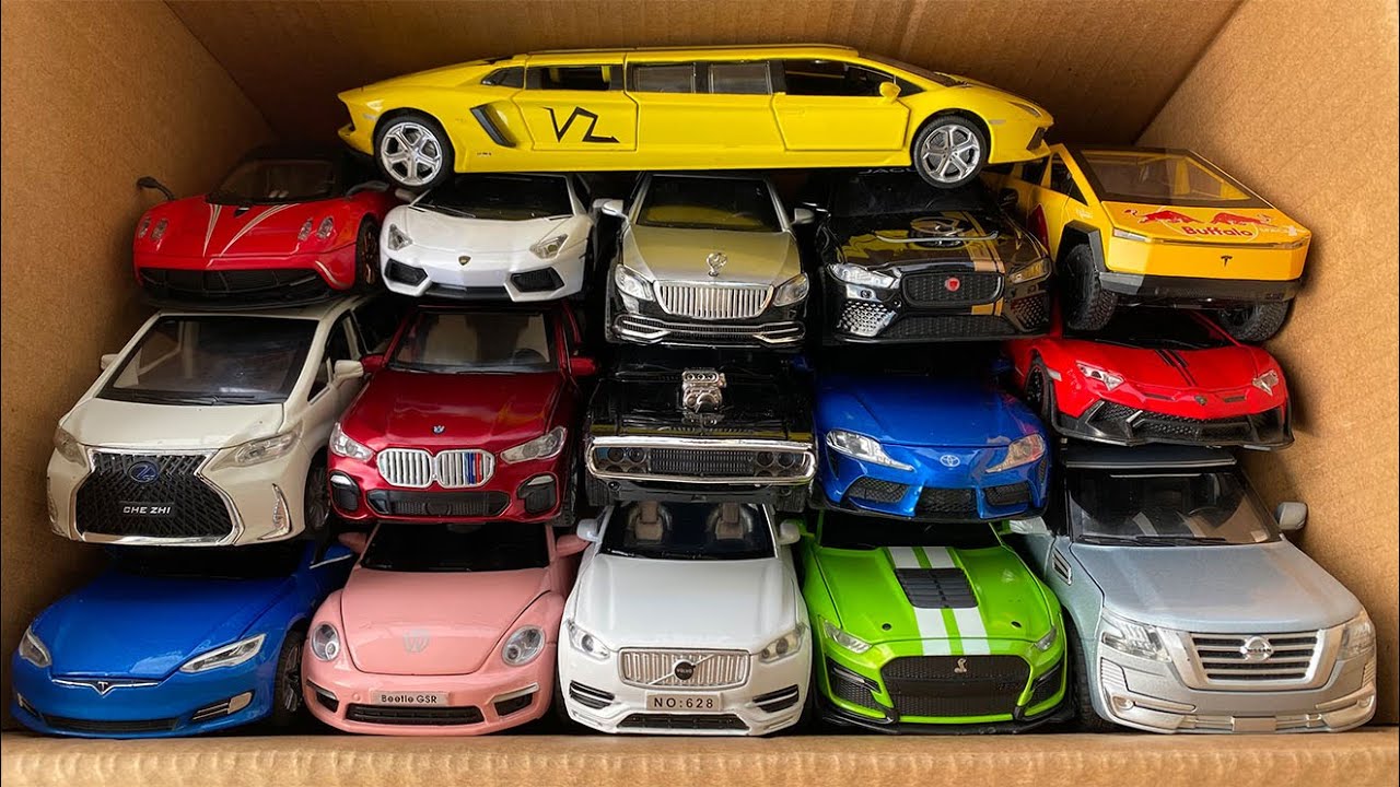 Box full of diecast Cars, Lamborghini, Tesla, Pagani, Jaguar, Lexus ...