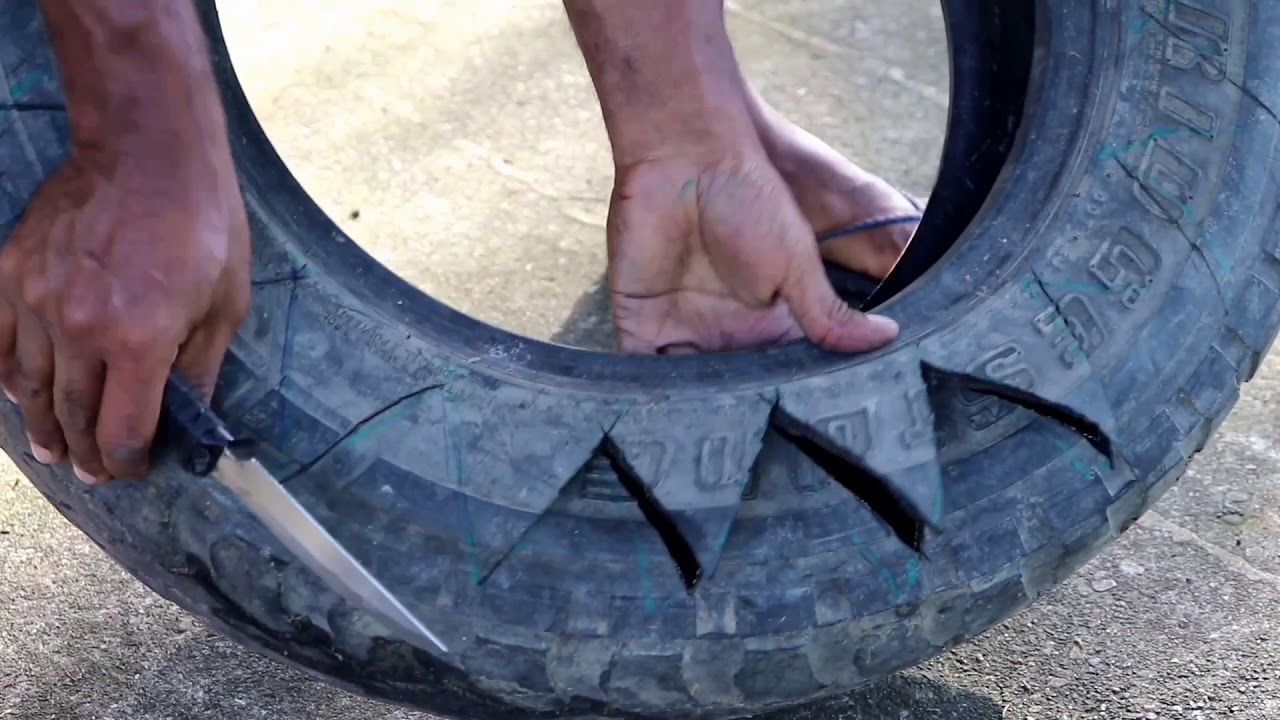 How to make flower pot out of old tyre (Tok Pisin) - YouTube