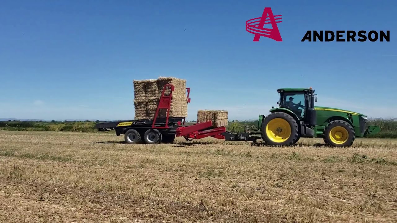 Anderson Stackpro5400 loading large square bale, Sacramento, CA - YouTube
