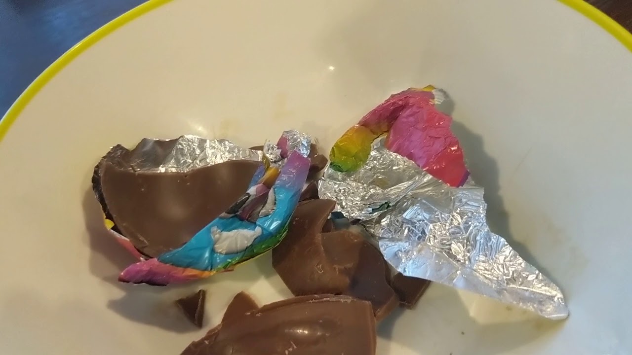 Opening up Shopkins and a poop emoji chocolate egg - YouTube