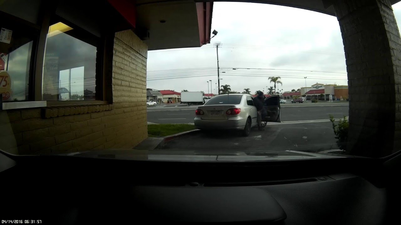 Car gets stuck leaving drive-thru - YouTube
