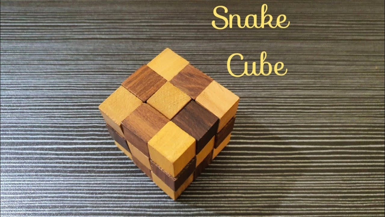 Solving the hardest wooden puzzle | Snake cube - YouTube