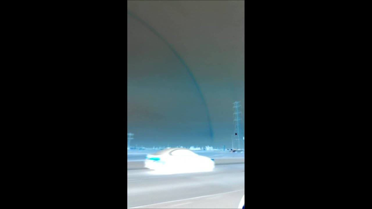 Negative rainbow reflecting glass sky - YouTube