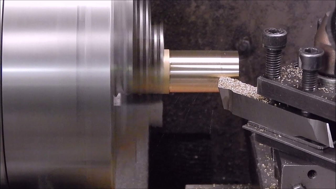 Turning home cast brass round stock on a 10" swing Chinese lathe - YouTube