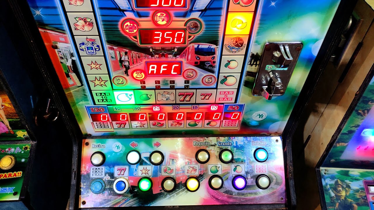 le apuesto a 5 frutas en la maquinita tragamoneda de estrella del metro ...
