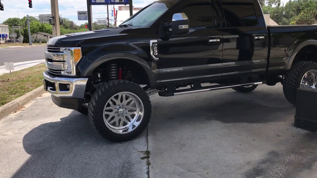 2017 Ford F-250 lifted on 38/13.5/24 nittos 24x12 American force wheels ...