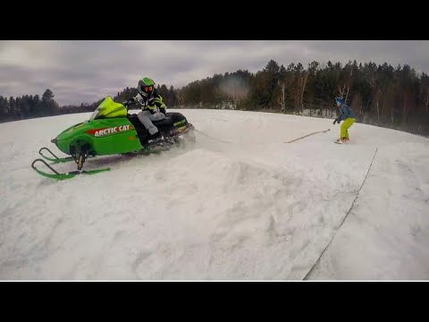 Snowboarding behind a Snowmobile! - YouTube