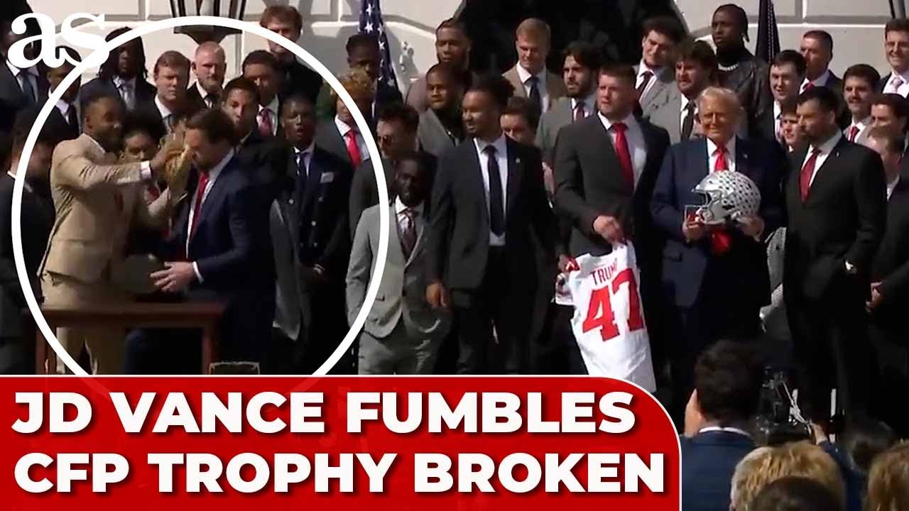 JD VANCE FUMBLES and BREAKS CFP trophy in front of OHIO STATE TEAM at ...