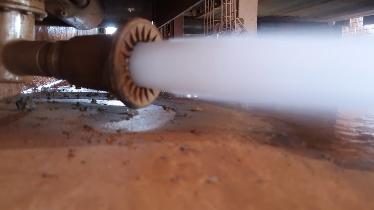 Track Straight Automated Under Conveyor Wash Down System - YouTube